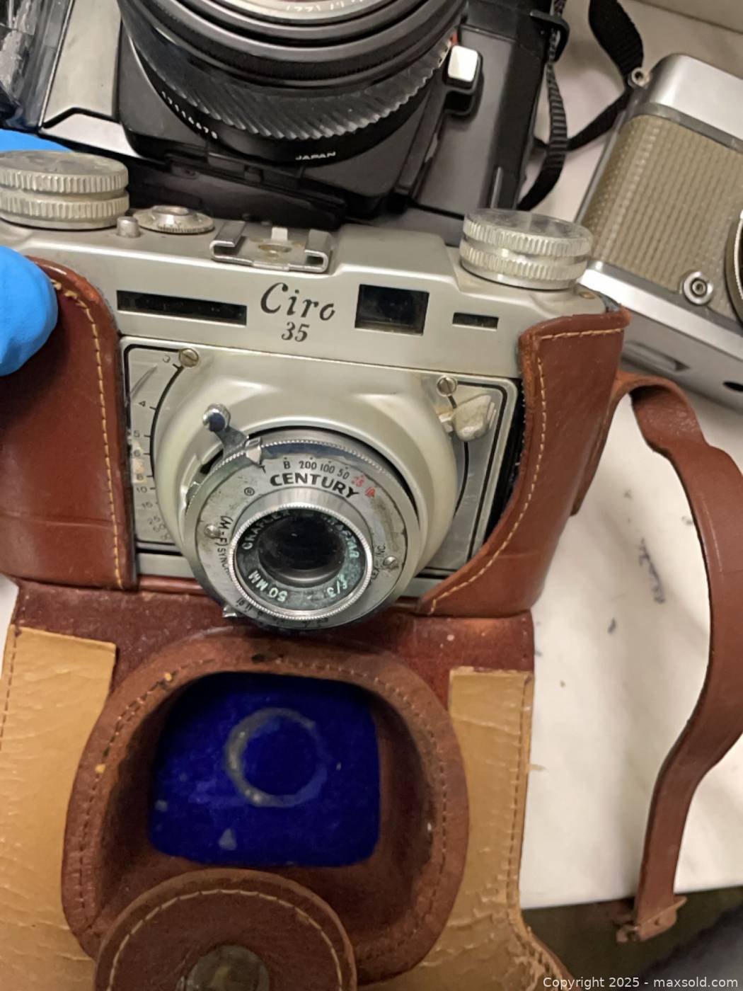Minolta Maxxum 7000, Ciro 35, half-frame camera | Maxsold
