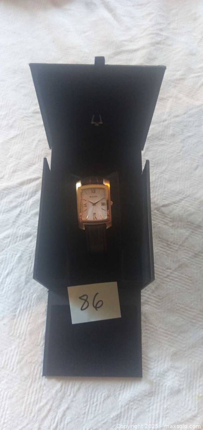 Bulova gold-tone men’s rectangular watch | Maxsold