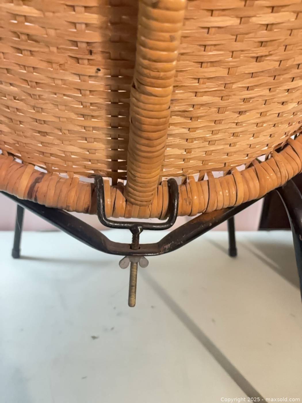 Retro wicker curved chair | Maxsold