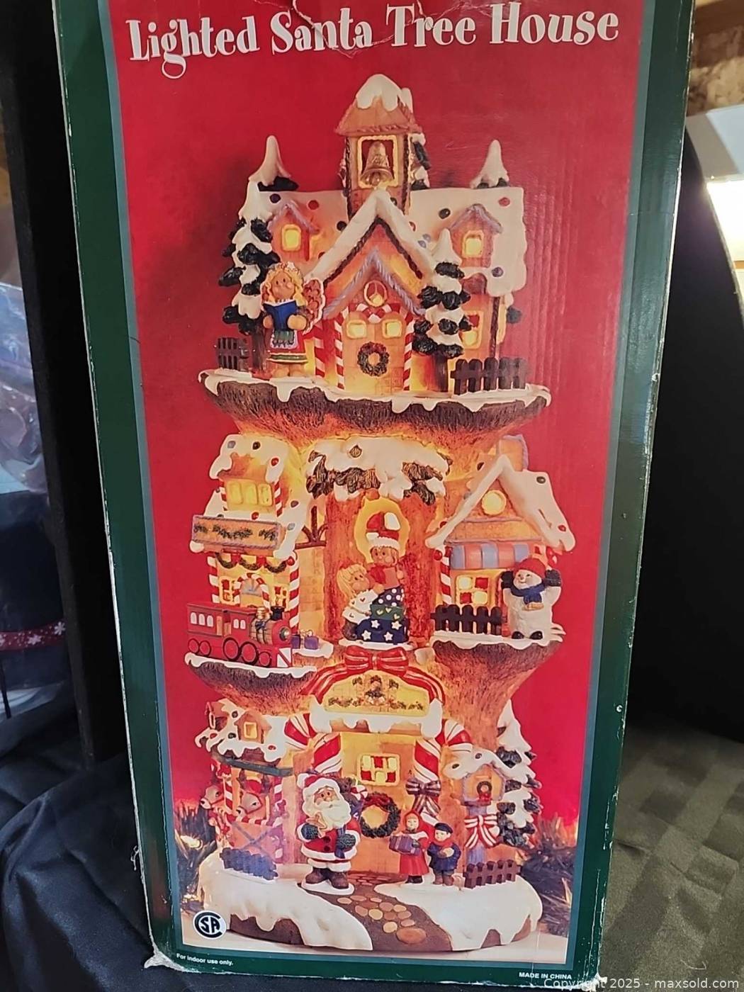 Lighted Santa Tree House holiday figurine | Maxsold