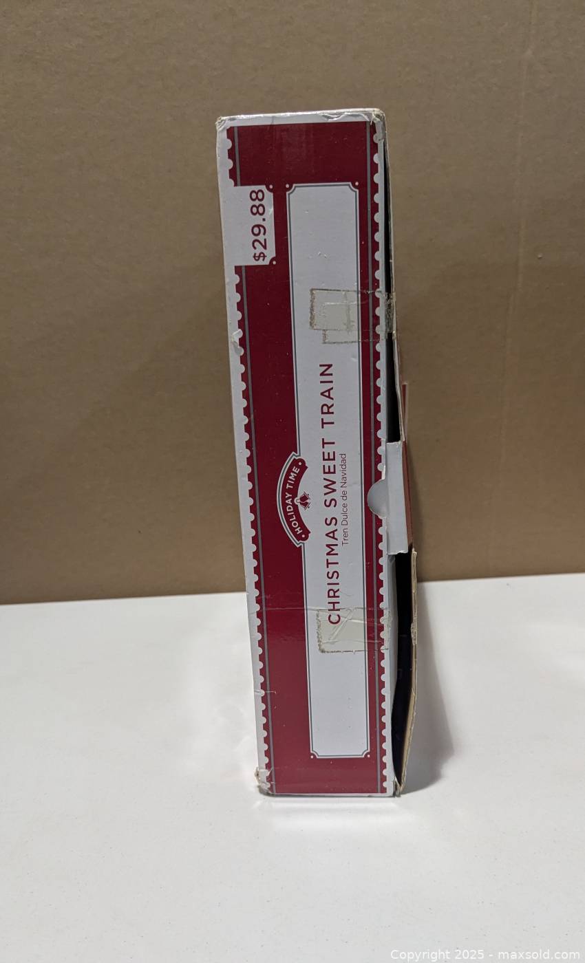 Holiday Time Christmas Sweet Train animated tree train set | Maxsold