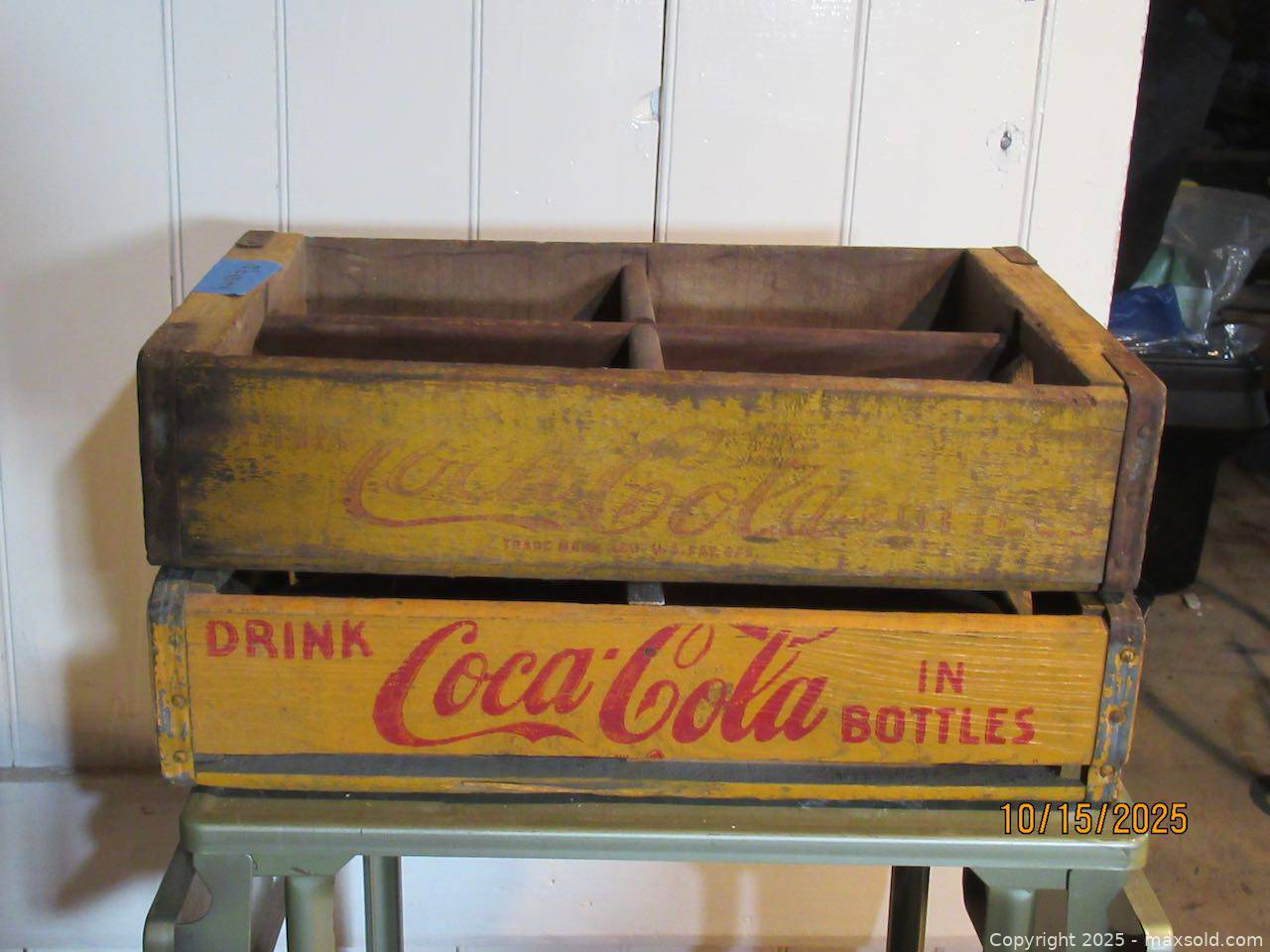 German Coca-Cola vinyl banner and wooden crates | Maxsold