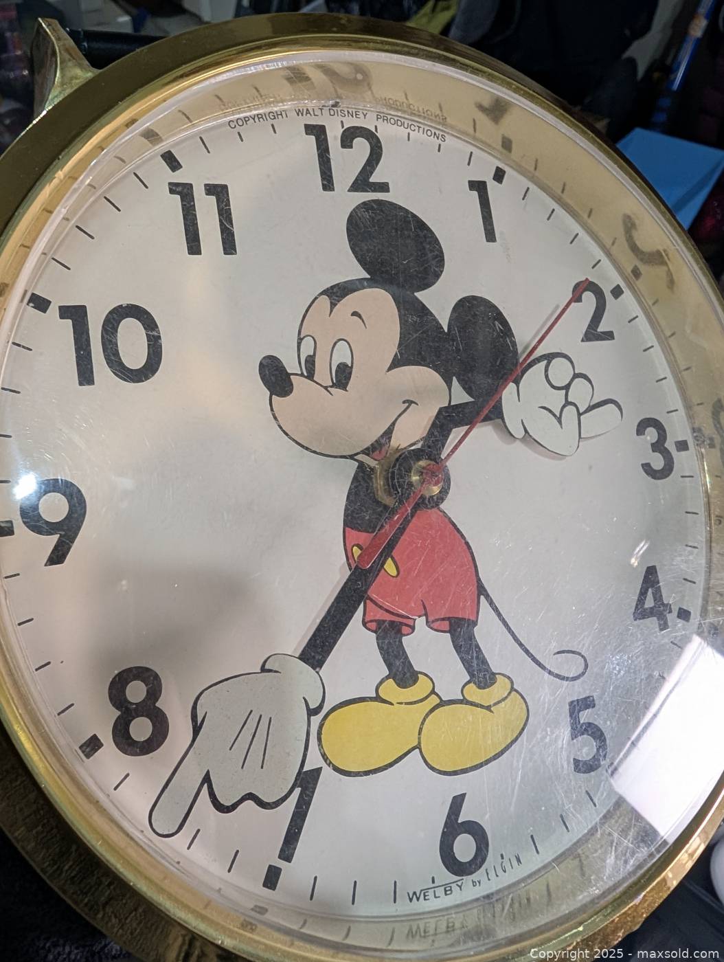 Disney Mickey Mouse moving-arm wristwatch wall clock | Maxsold