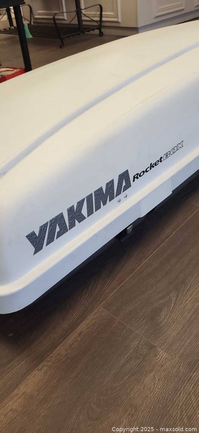 Yakima RocketBox rooftop cargo carrier with keys | Maxsold