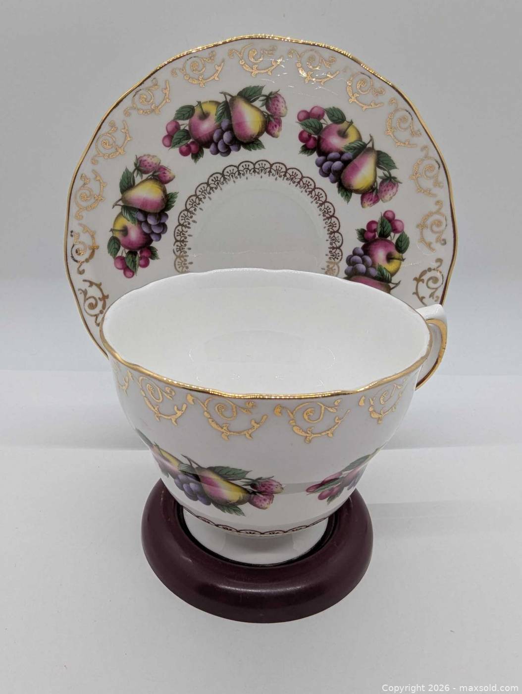 Colclough bone china fruit motif teacup & saucer | Maxsold