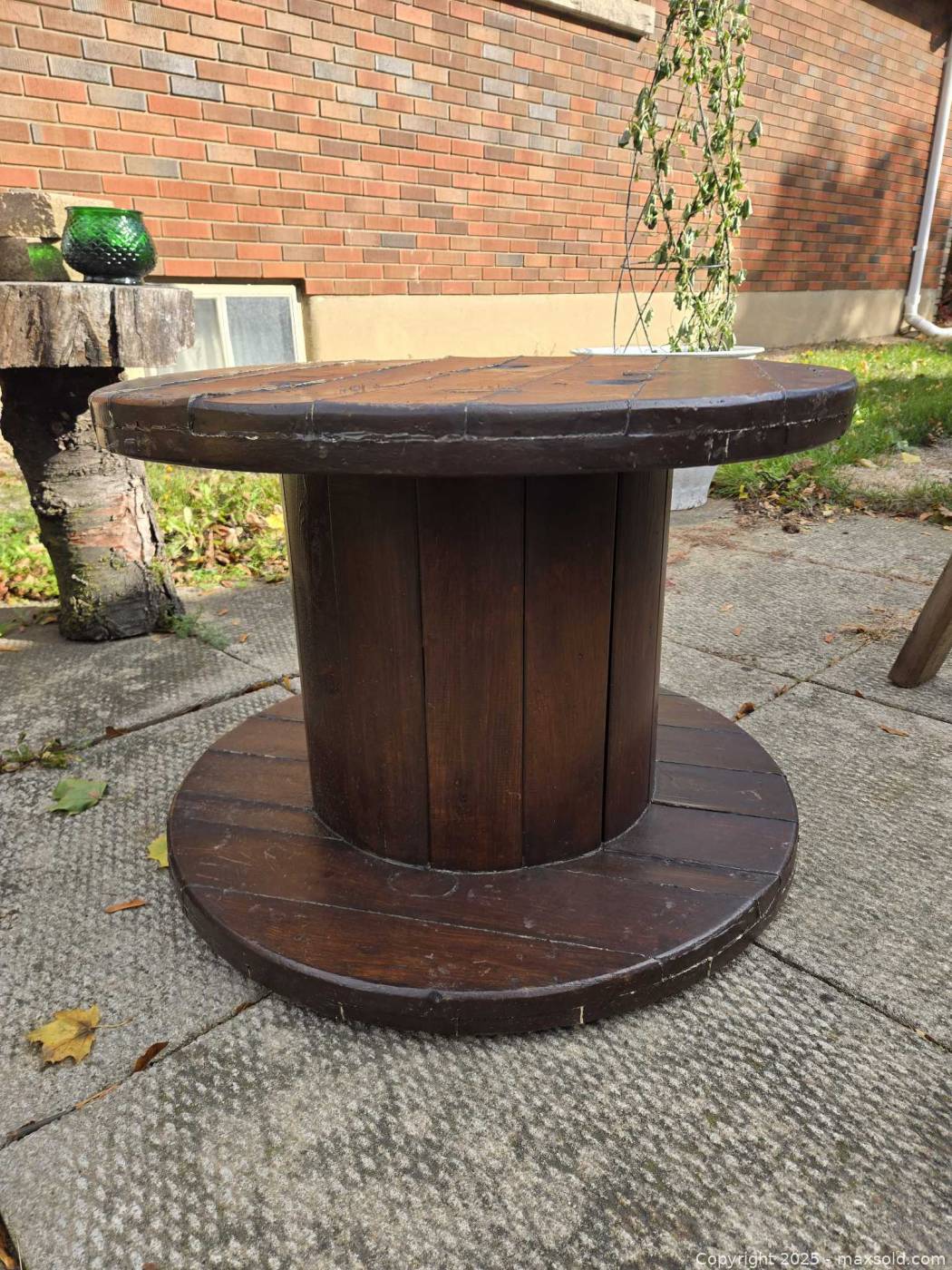 Large stained wood cable spool | Maxsold