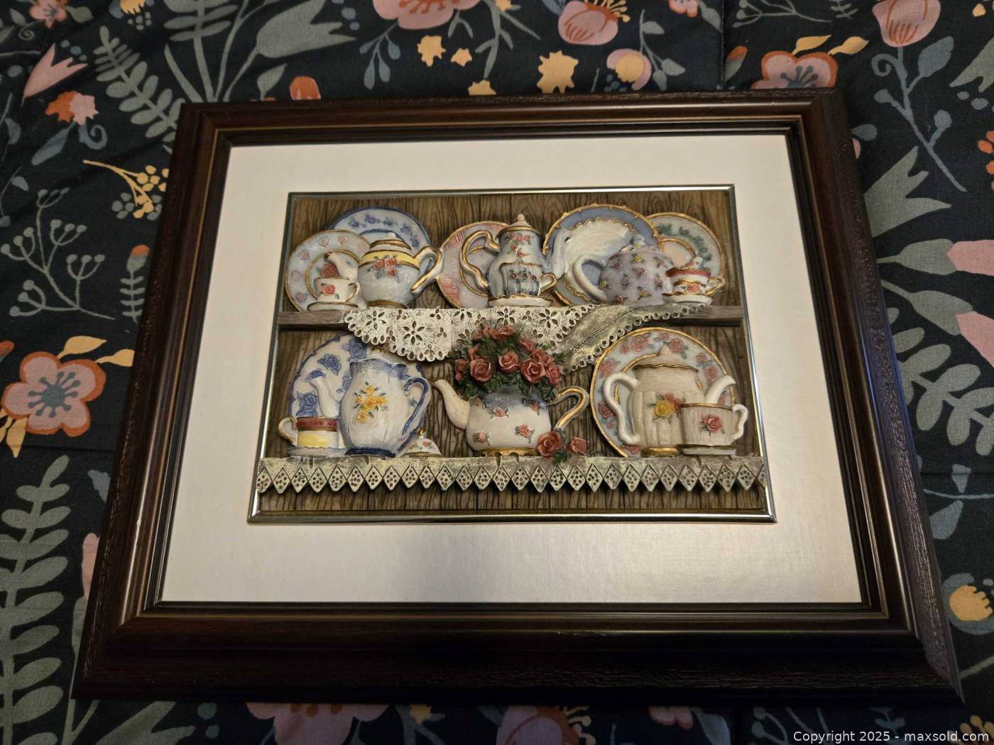 Framed resin wall art of teapots and plates | Maxsold