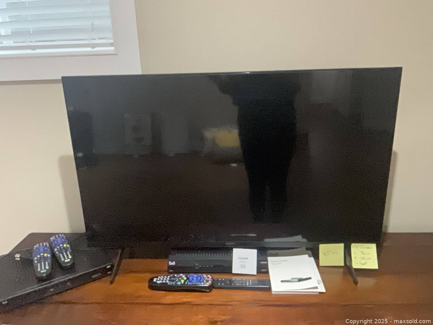 43" flat-screen TV with Blu-ray player & remotes | Maxsold