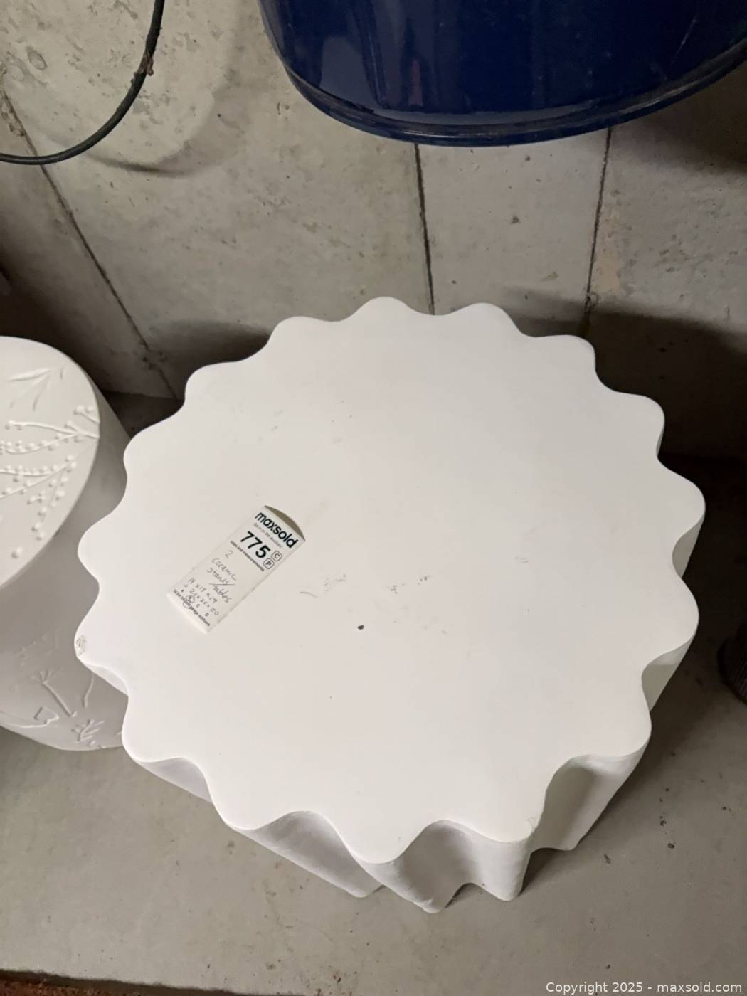 Two white ceramic garden stands | Maxsold