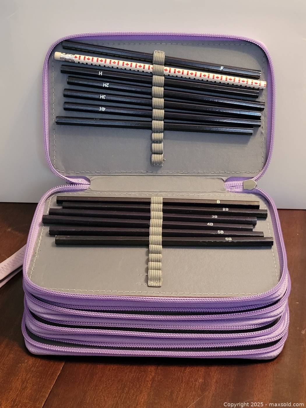 Lavender multi-compartment artist pencil case with graphite pencils ...