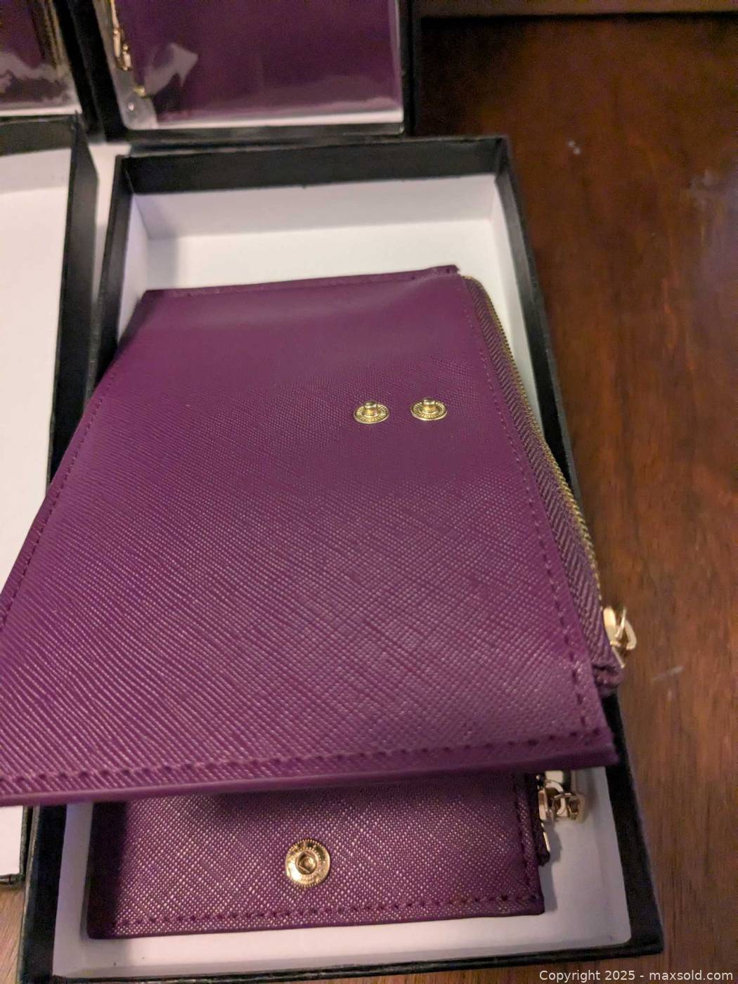 Five new boxed purple women's wallets | Maxsold