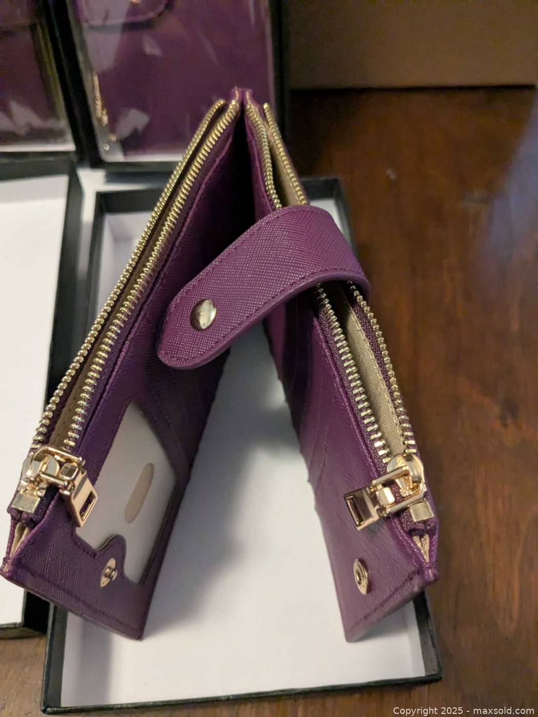 Five new purple dual-zip wallets | Maxsold