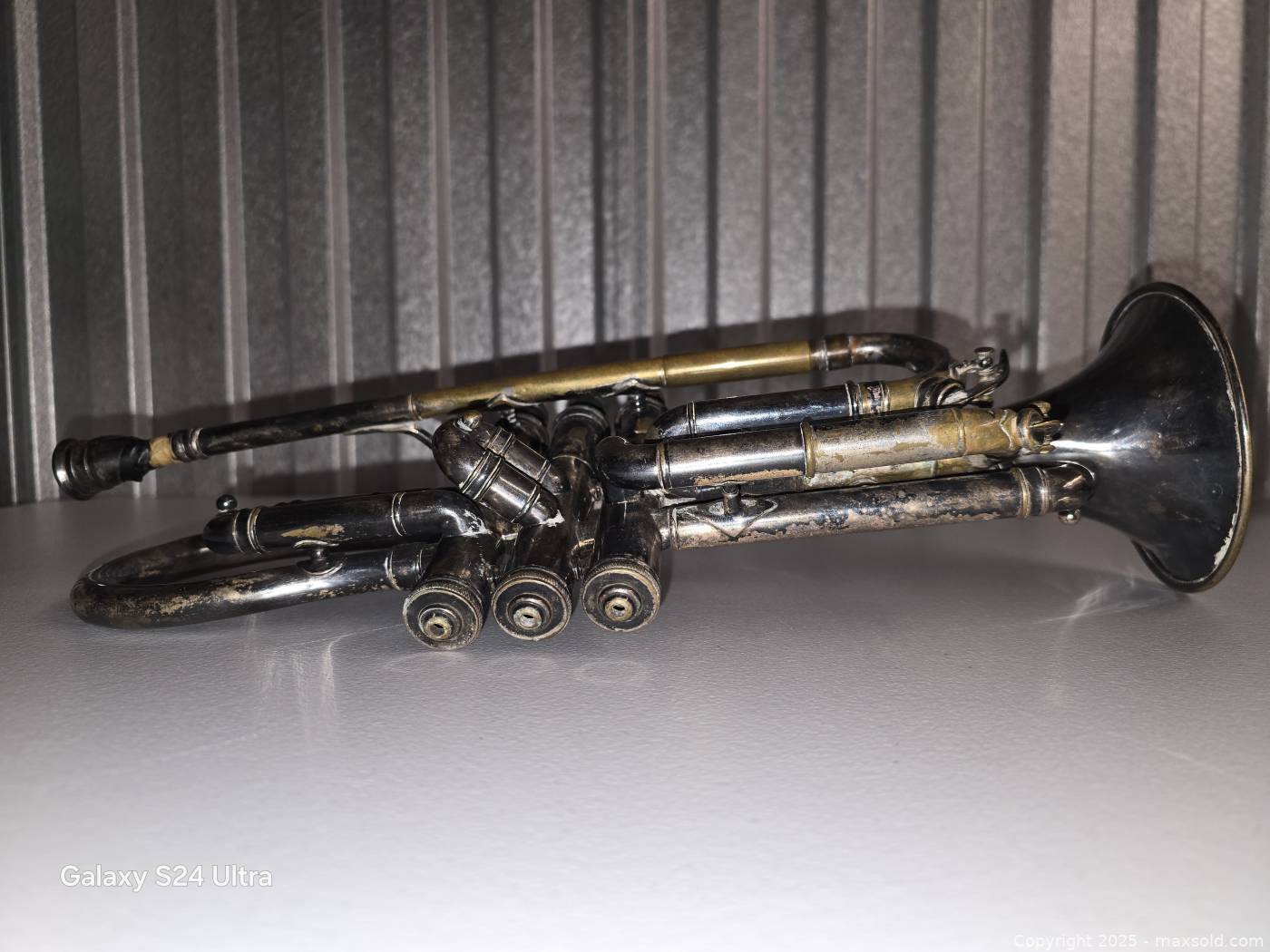 Antique Frank Holton & Co. silver-plated trumpet | Maxsold