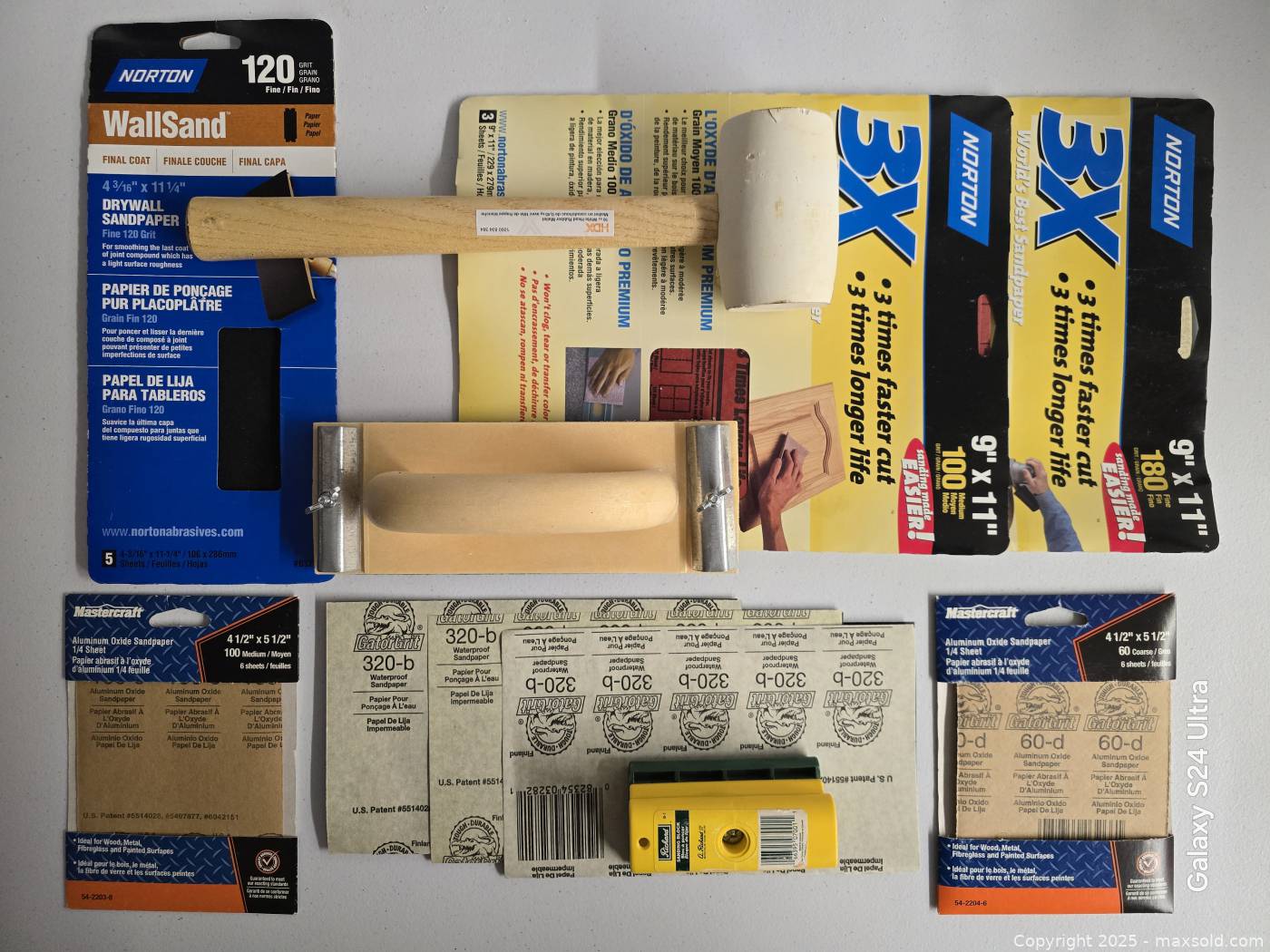 Sanding supplies and rubber mallet | Maxsold