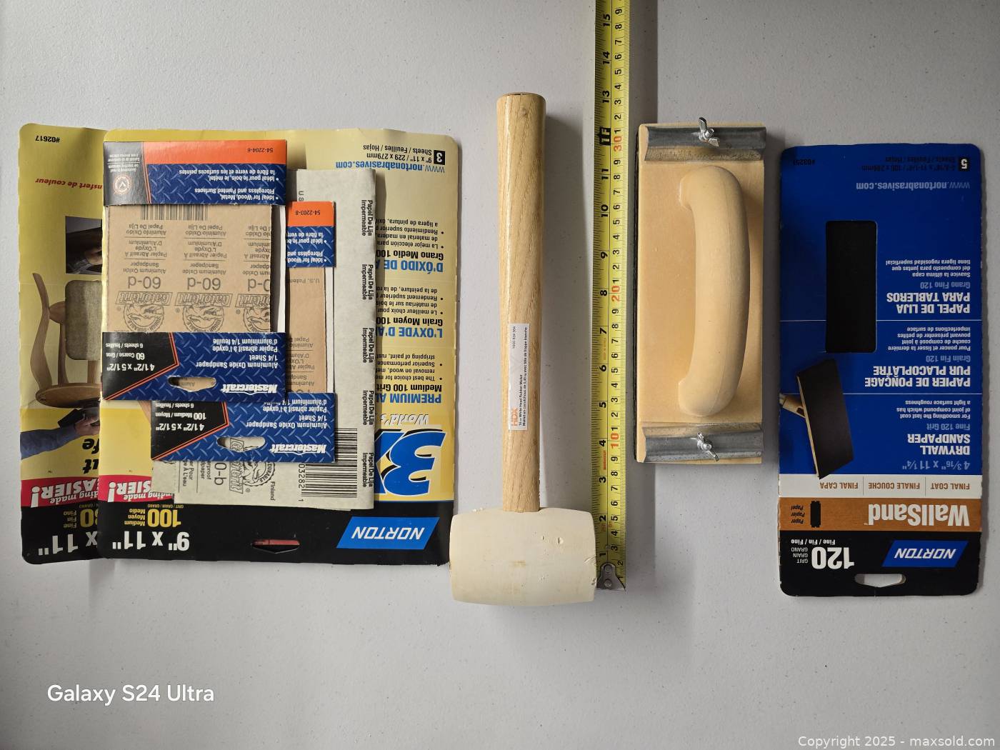 Sanding supplies and rubber mallet | Maxsold