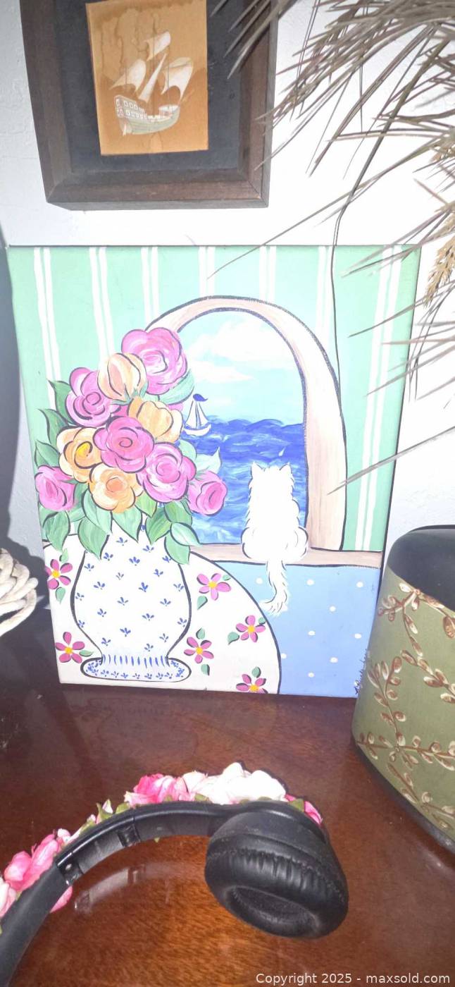 Painting, headphones, basket, faux flowers, vase, framed sailboat art ...