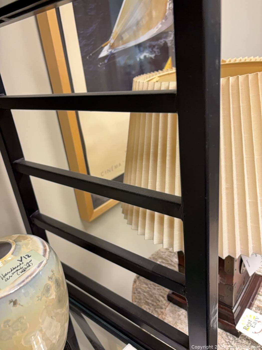 Wrought iron and glass display case | Maxsold