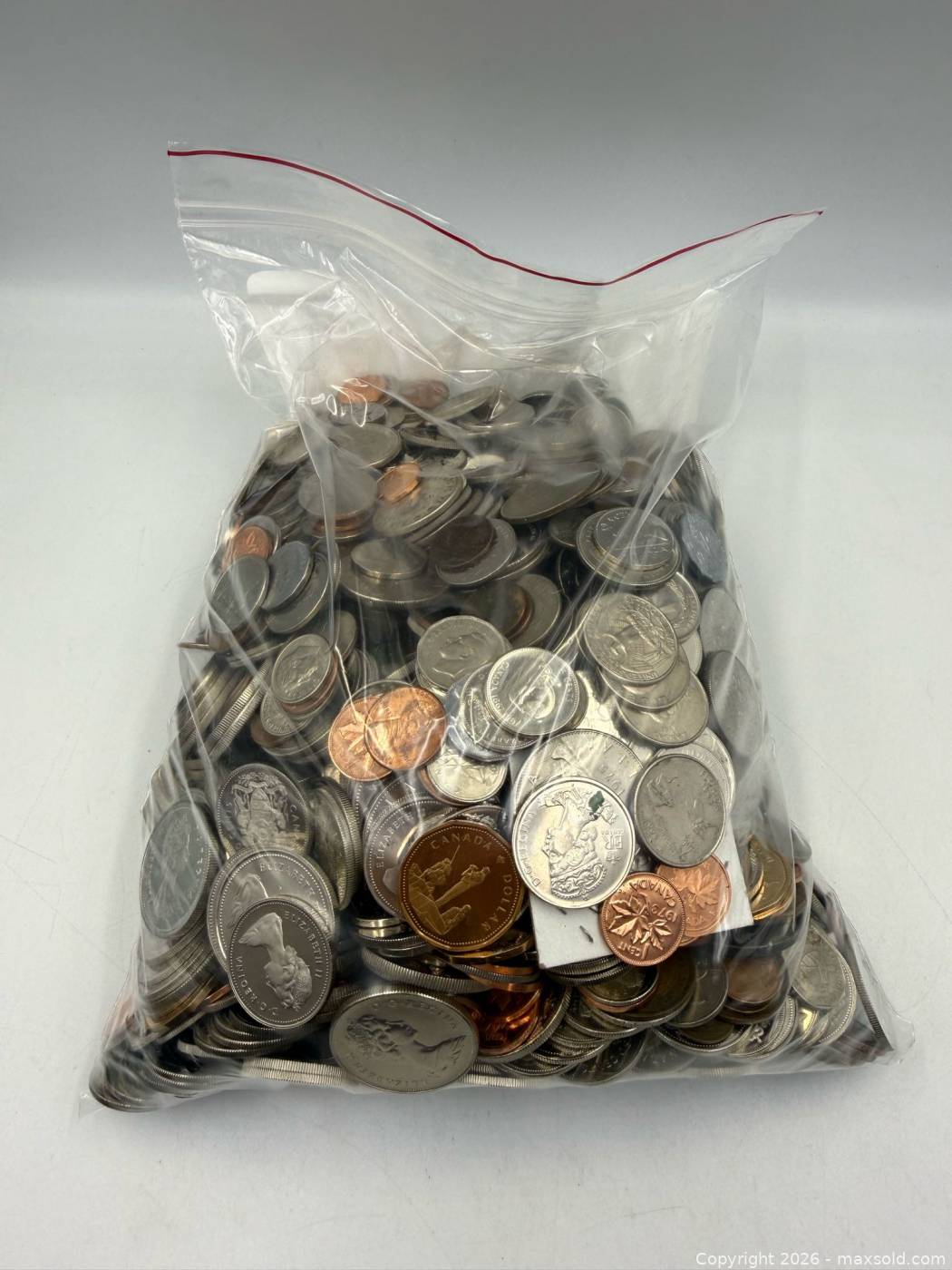 Bag of Canadian coins assorted denominations | Maxsold