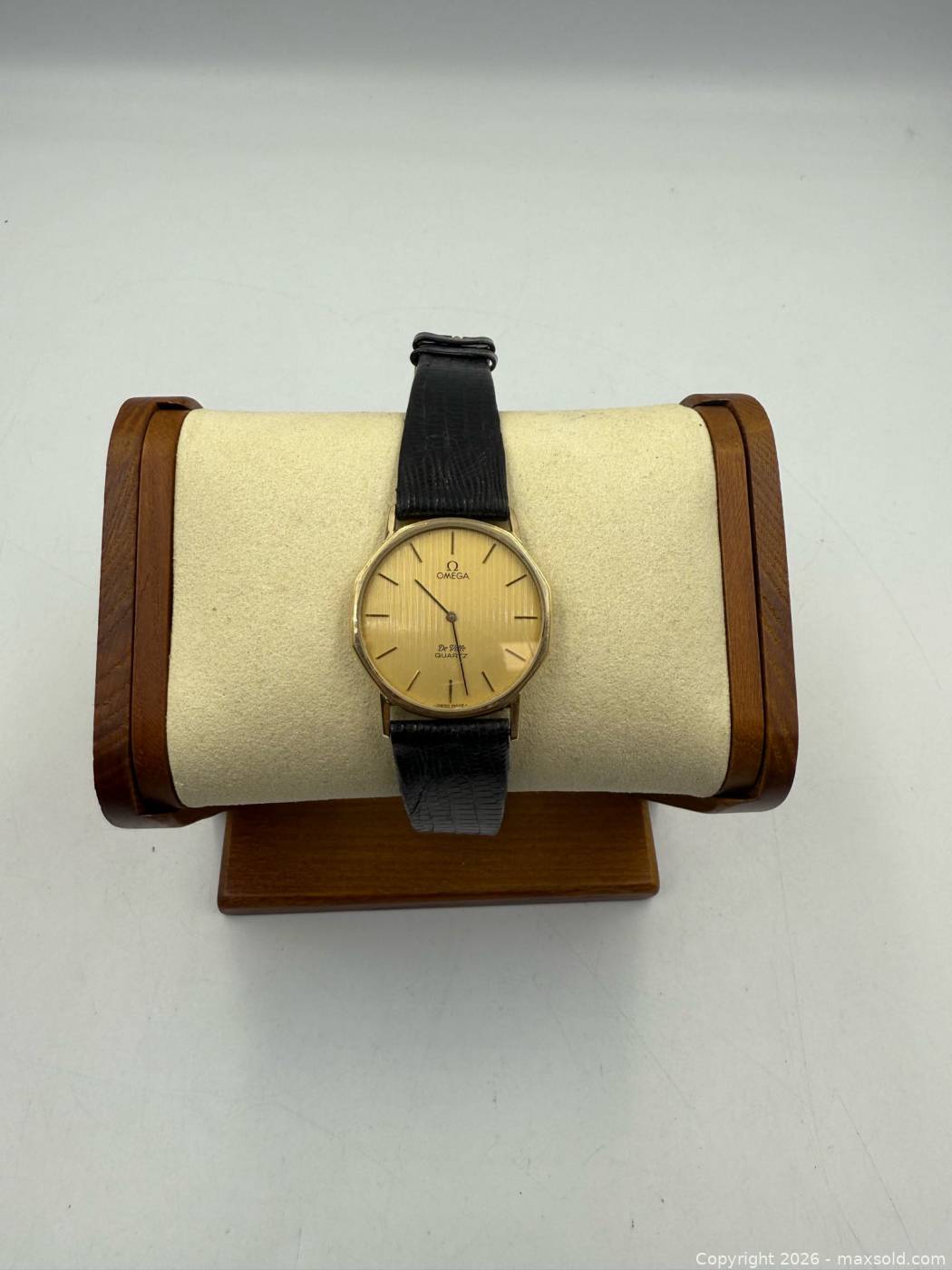 Omega 10k gold-filled quartz wristwatch | Maxsold