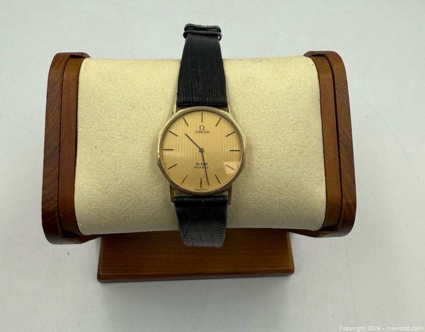 Omega 10k gold-filled quartz wristwatch | Maxsold