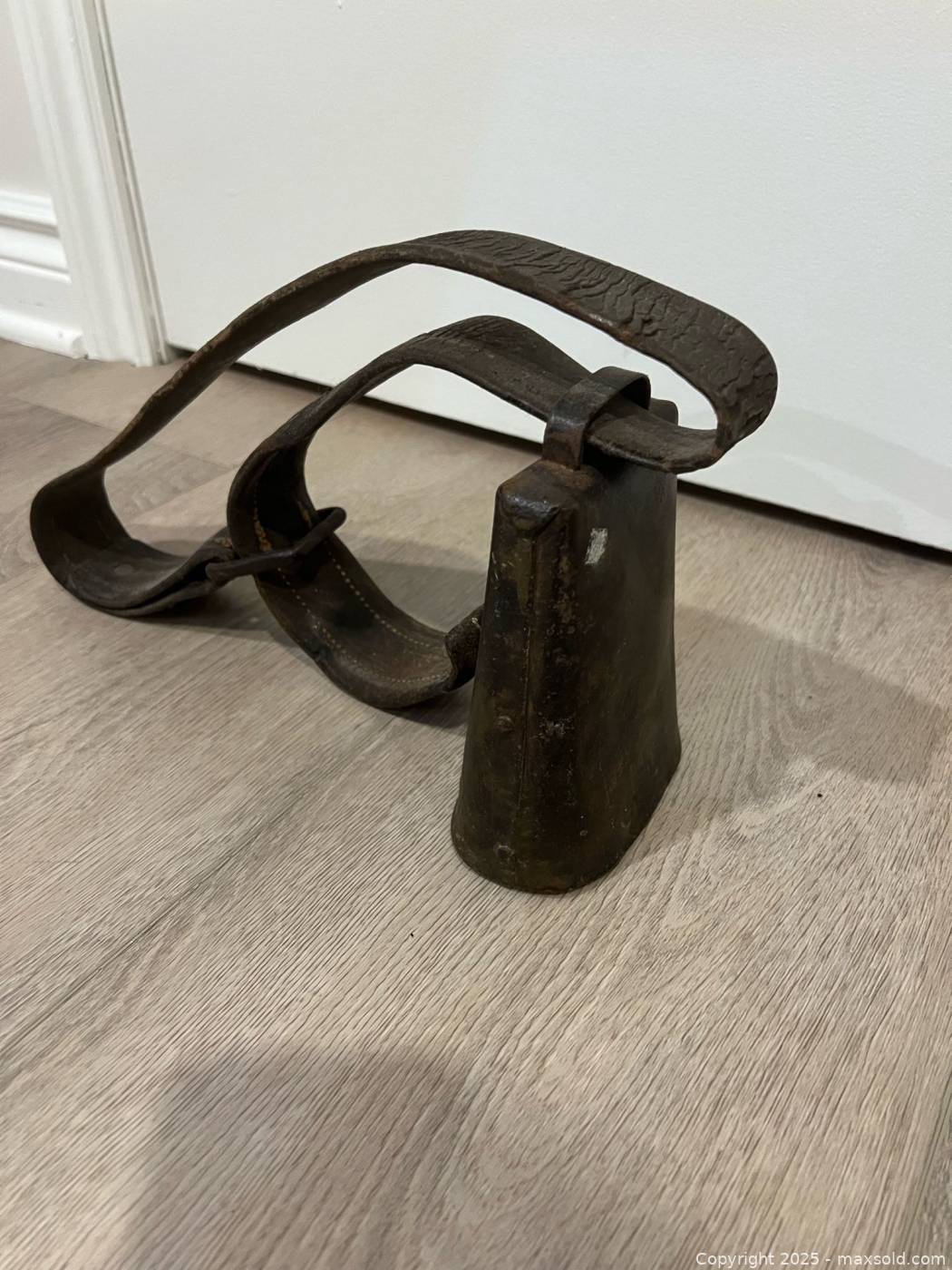 Antique metal cow bell with leather strap | Maxsold