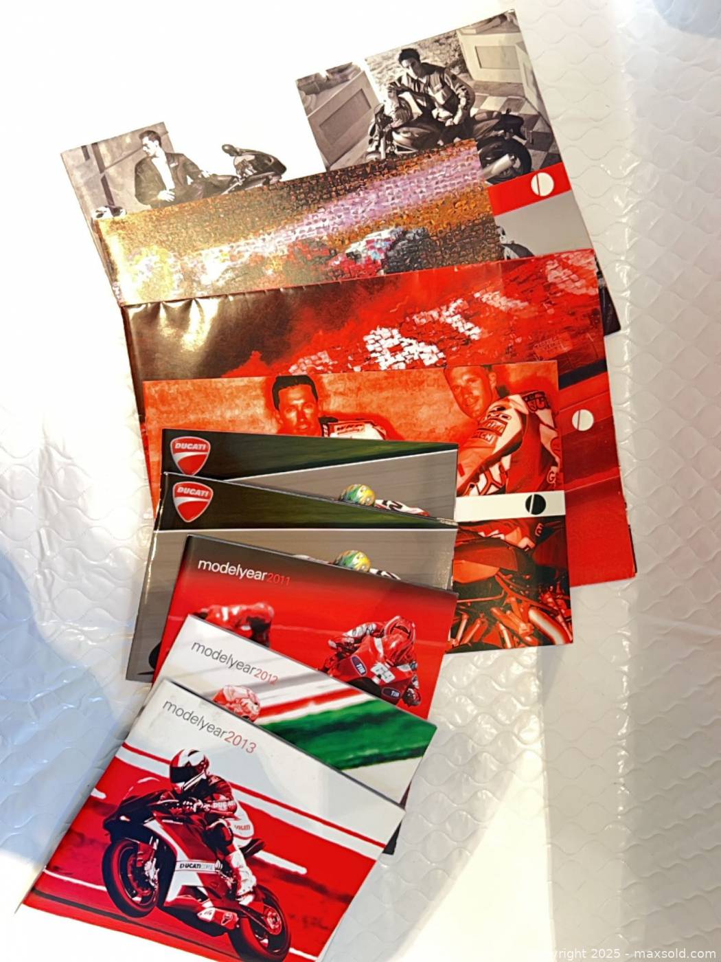 Ducati motorcycle sales brochures 1999-2013 | Maxsold