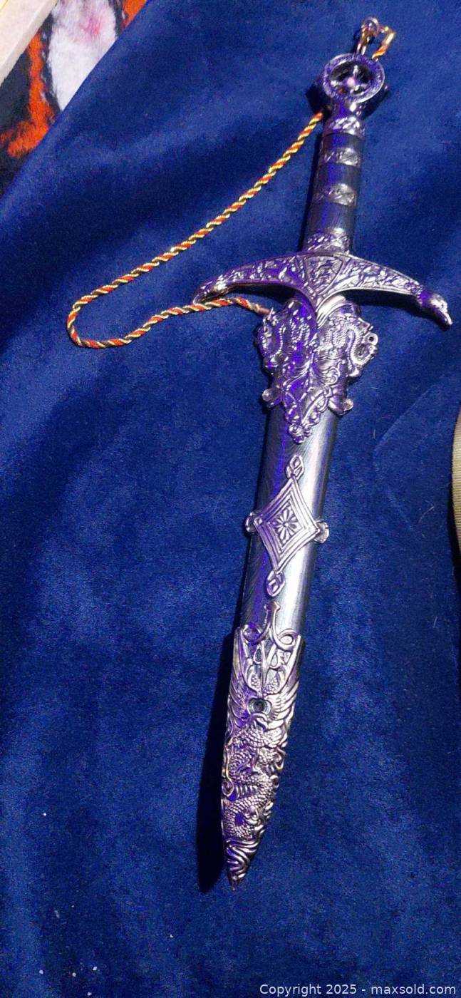 Ornate silver-tone dagger with scabbard | Maxsold