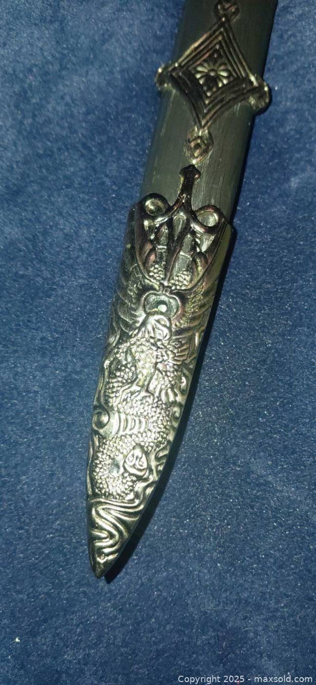 Ornate silver-tone dagger with scabbard | Maxsold