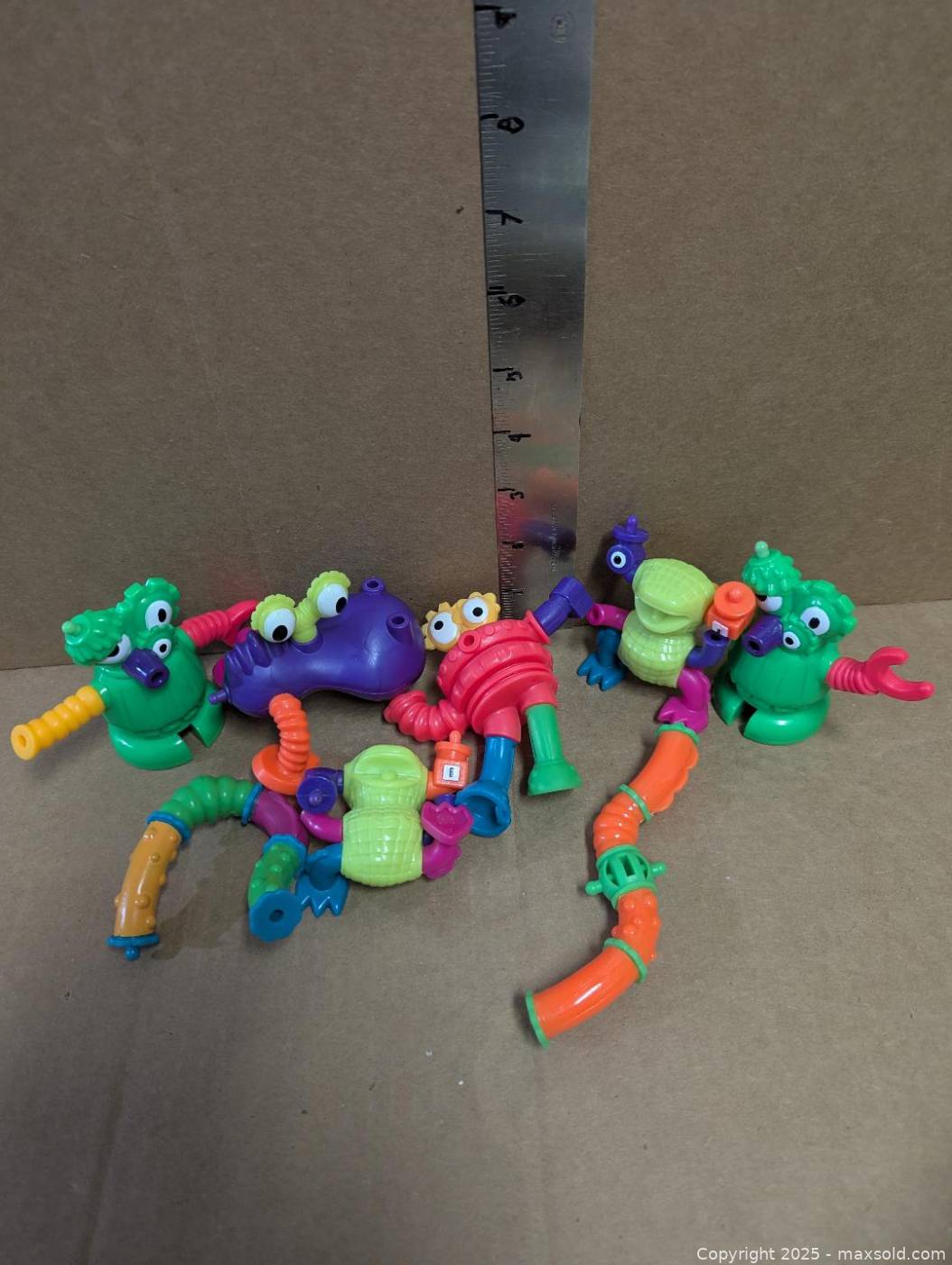 Large lot Nickelodeon Tangle Twist-a-Zoid toys 1996 | Maxsold