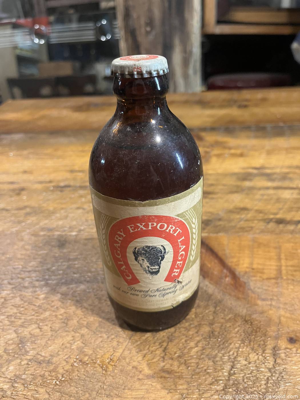 Vintage Calgary Export Lager stubby beer bottle with cap | Maxsold