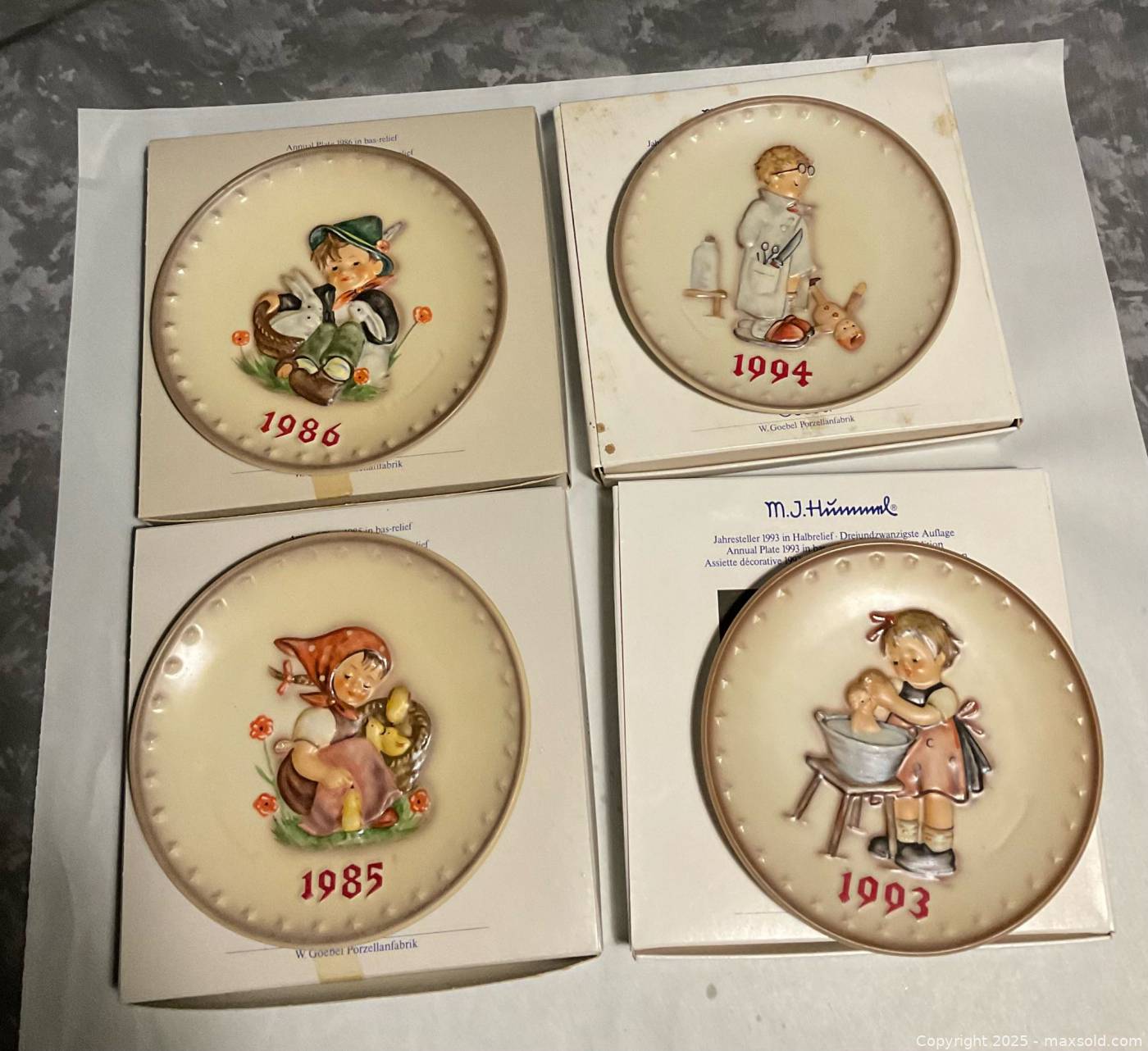 Goebel M.J. Hummel annual collector plates 1985-1994 set of 4 | Maxsold