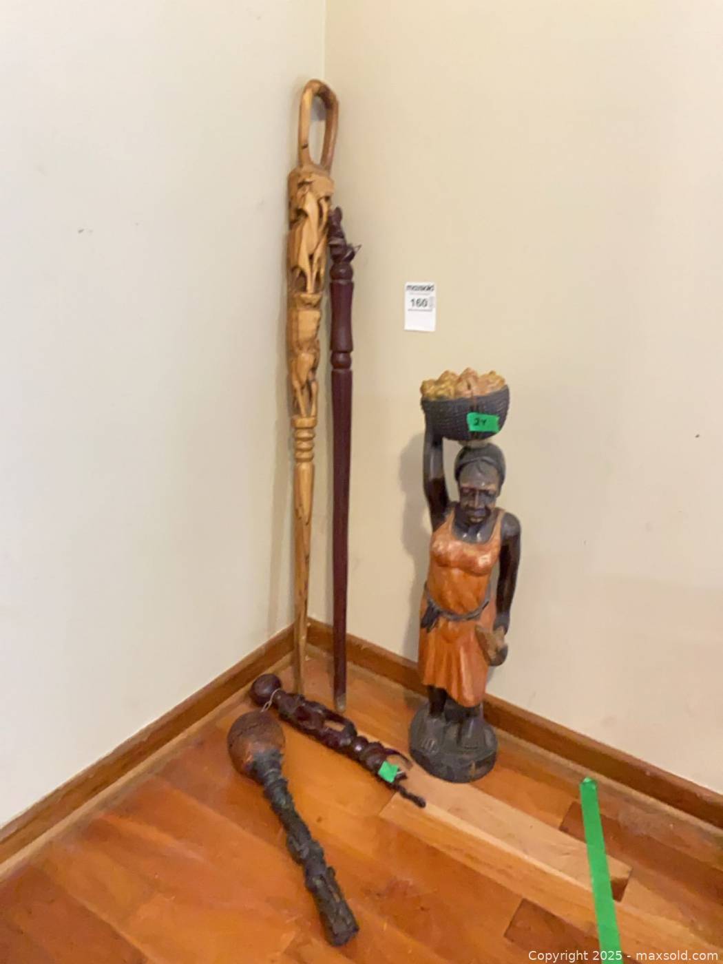 Carved African walking sticks, wood figure & shaker | Maxsold