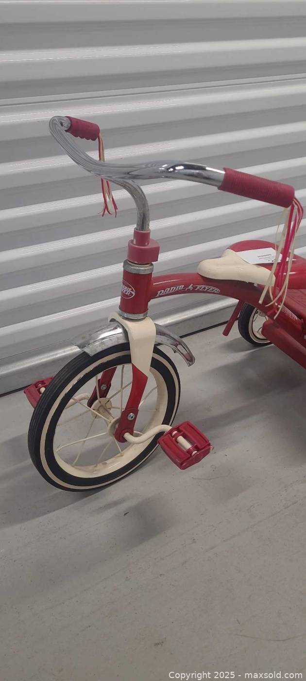Radio Flyer red & white metal tricycle | Maxsold