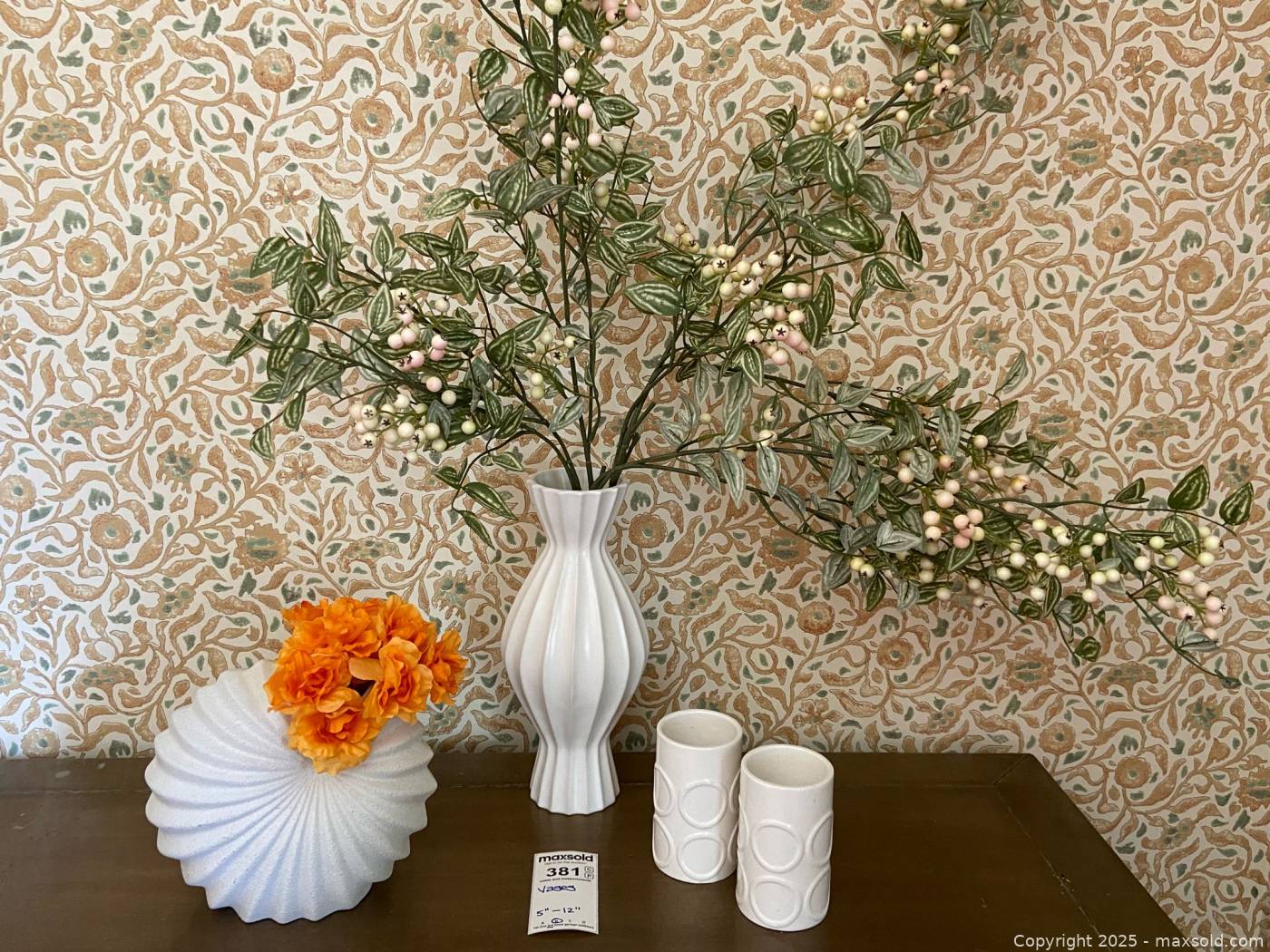 Jonathan Adler fluted vase with three white ceramic accent vases | Maxsold