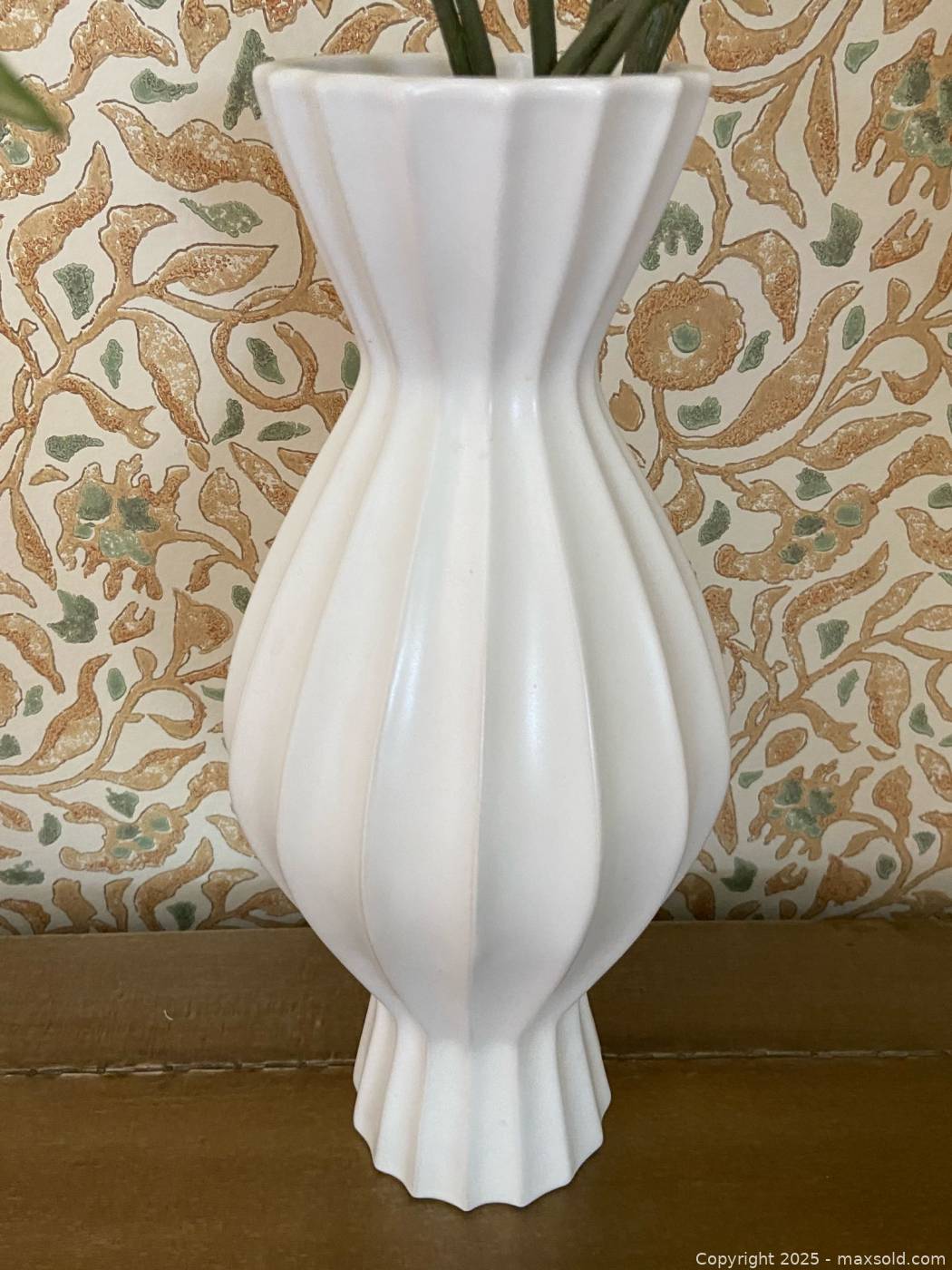Jonathan Adler fluted vase with three white ceramic accent vases | Maxsold