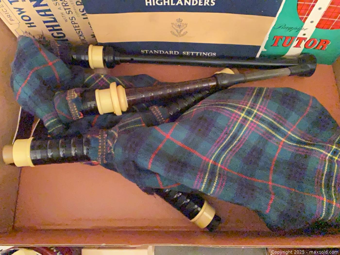 Queens Own Highlanders bagpipes with reeds books and maintenance supplies | Maxsold