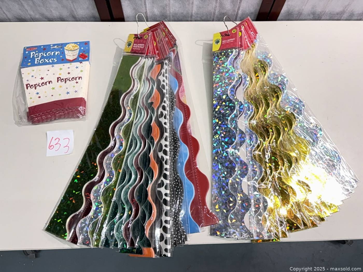 Holographic & printed party trim strips, popcorn boxes | Maxsold