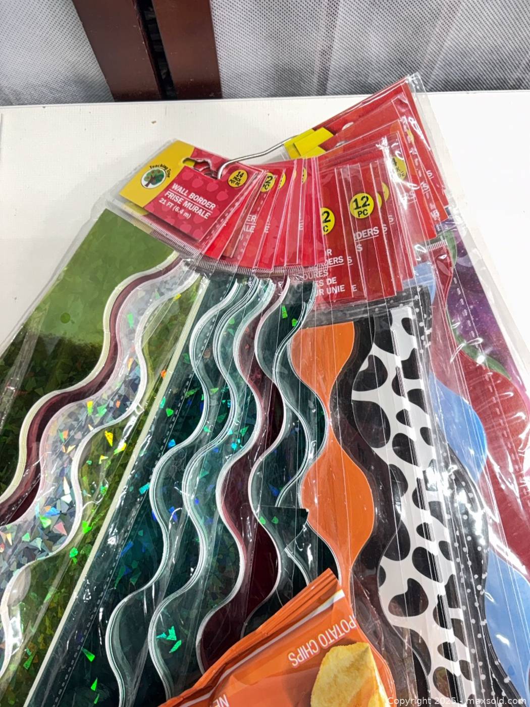 Holographic & printed party trim strips, popcorn boxes | Maxsold