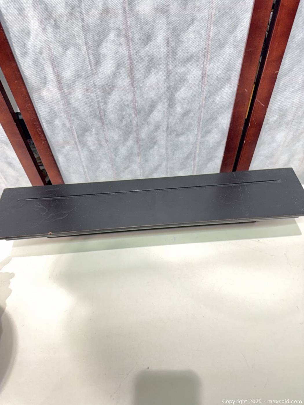 Sterling & Noble wall clock, black plate shelf, metal table lamp | Maxsold