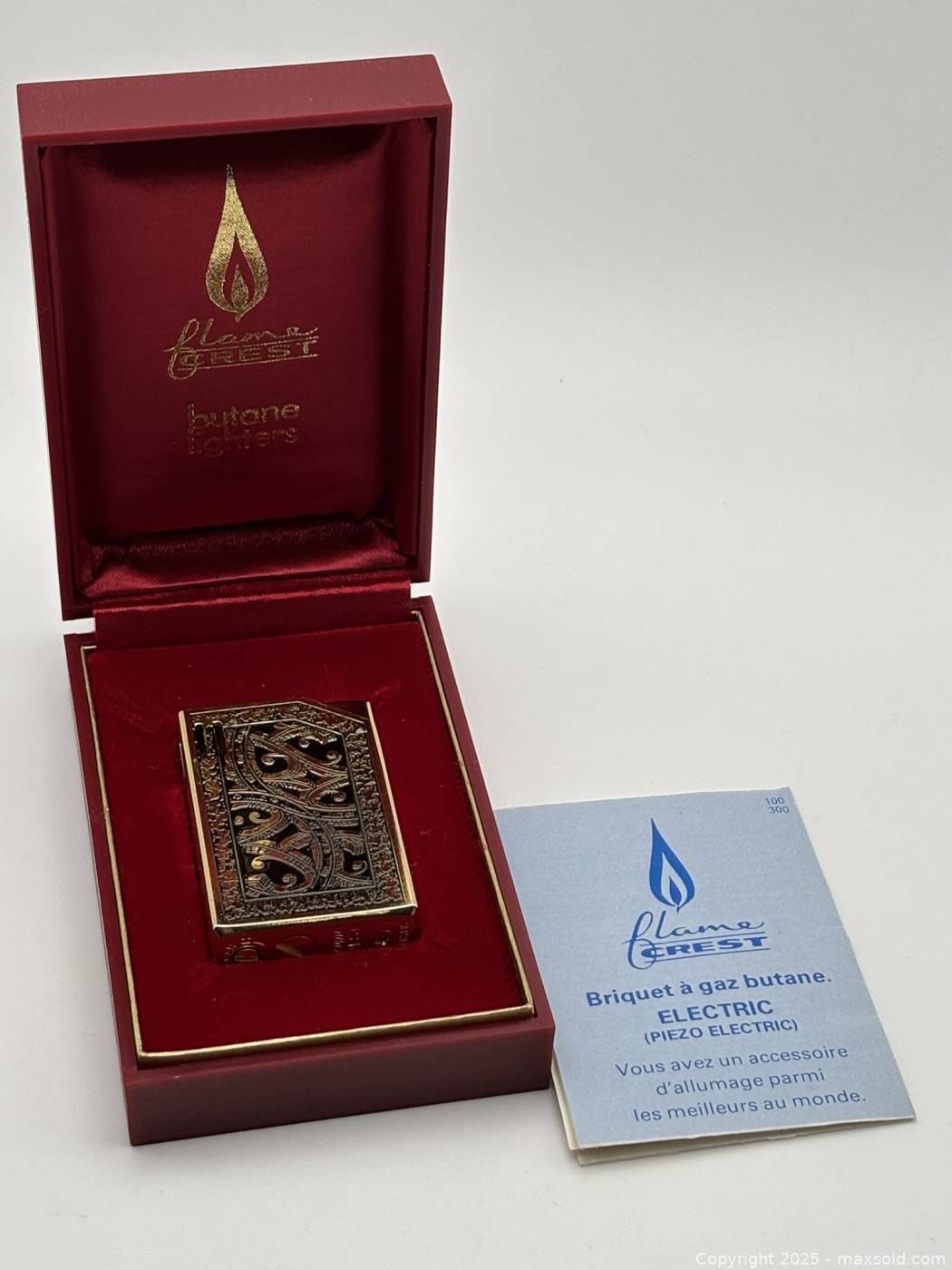 Flame Crest gold-tone butane table lighter with box | Maxsold