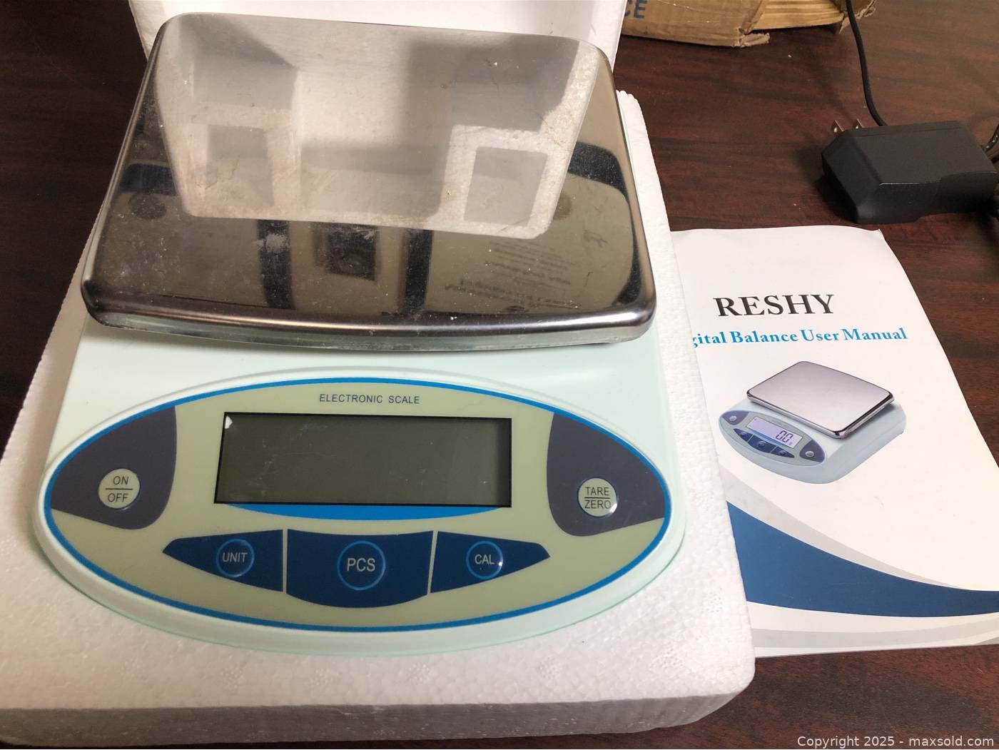 Reshy electronic digital balance scale with adapter and manual | Maxsold