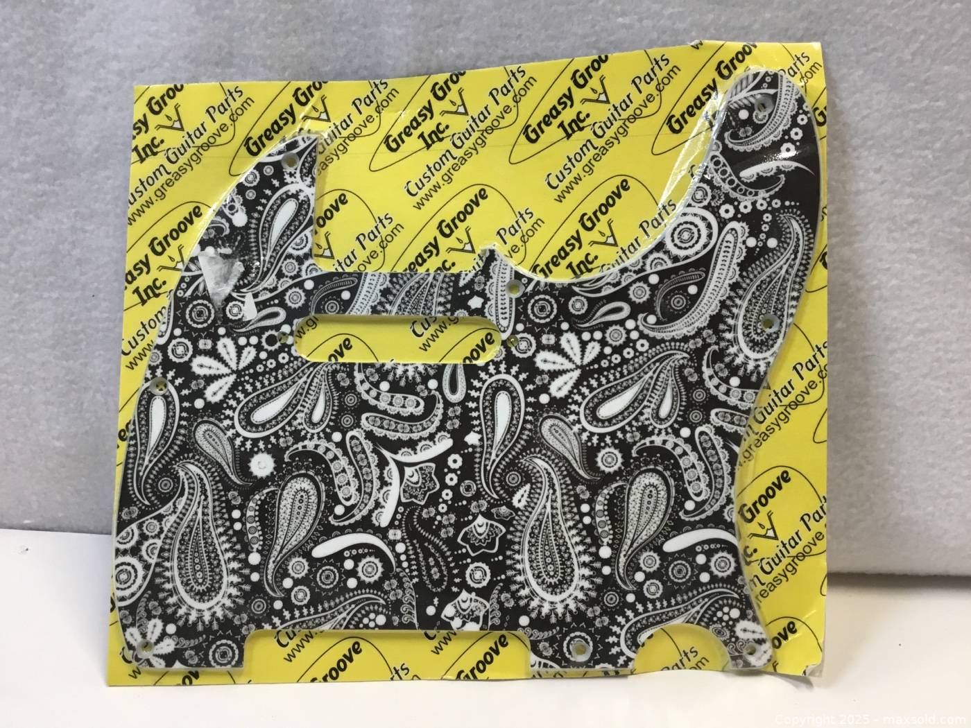 Greasy Groove paisley electric guitar pickguard | Maxsold