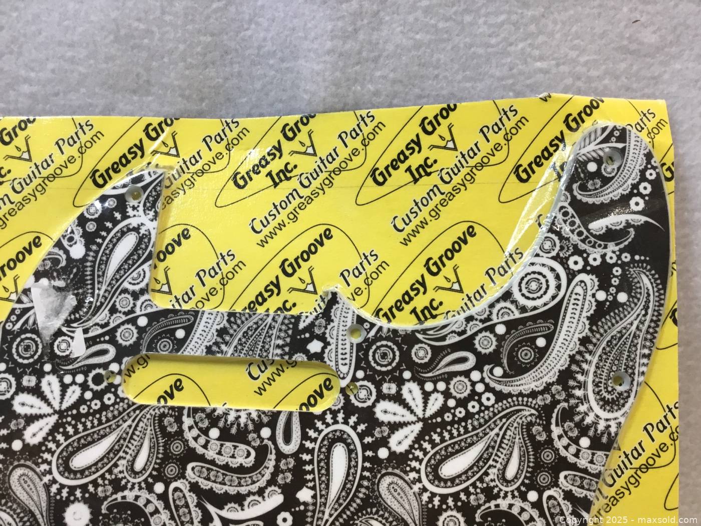 Greasy Groove paisley electric guitar pickguard | Maxsold
