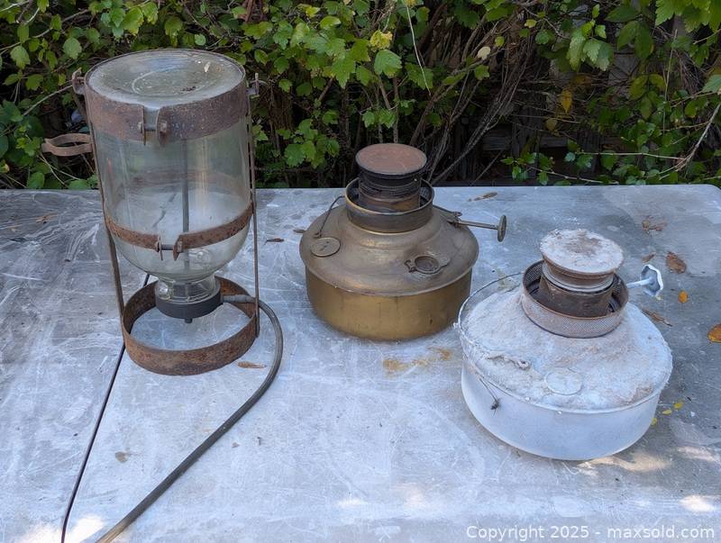 Antique farm barn heaters and glass IV bottle | Maxsold
