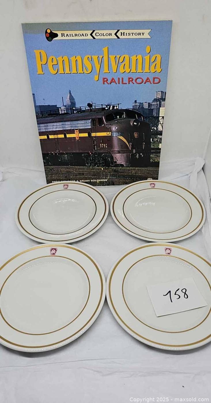 Pennsylvania Railroad snack plates and book | Maxsold