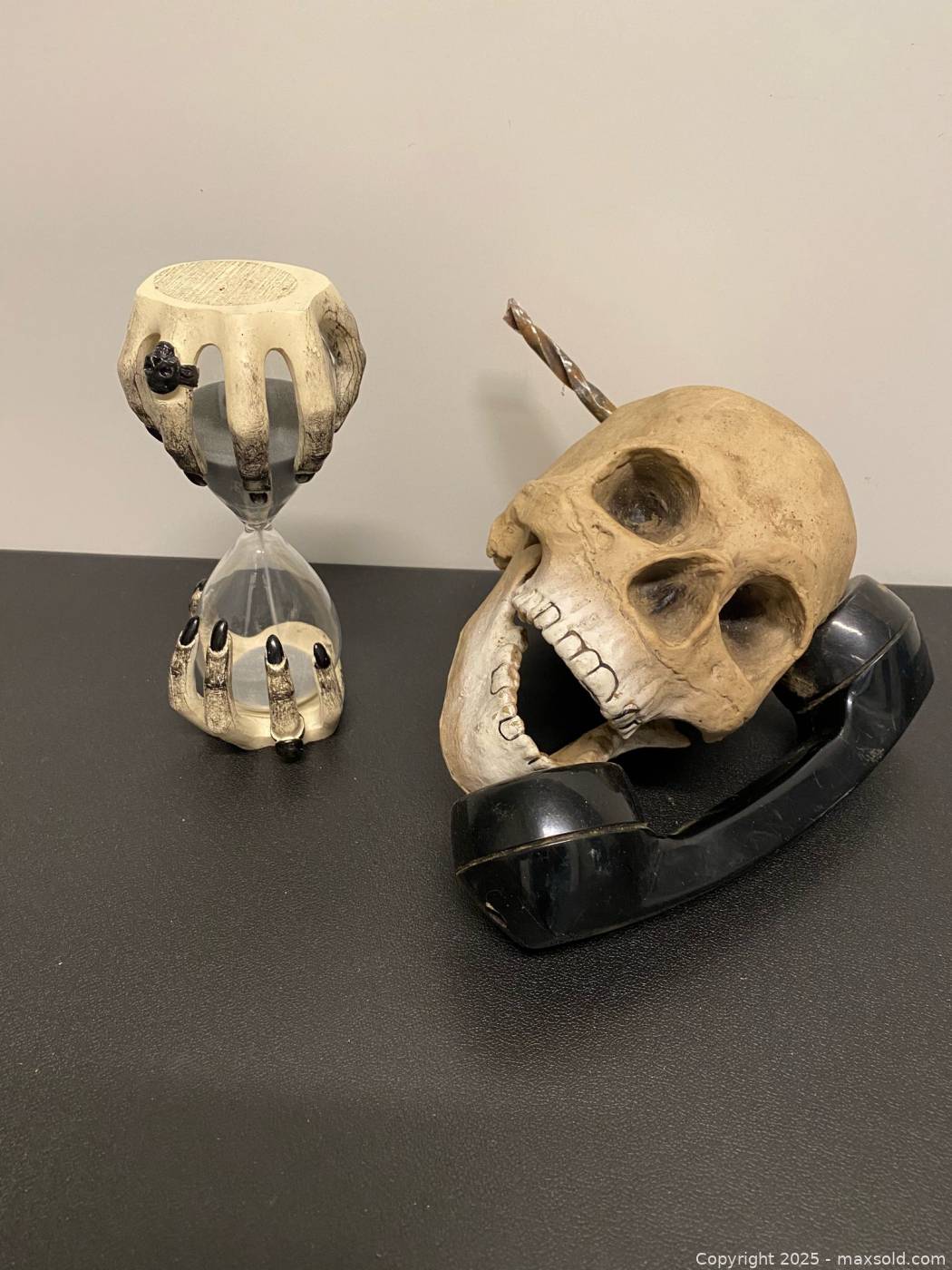 Skeleton Hand Hourglass and Skull Telephone Prop | Maxsold