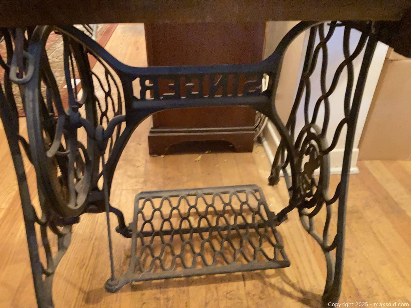 Singer treadle sewing machine in cabinet | Maxsold