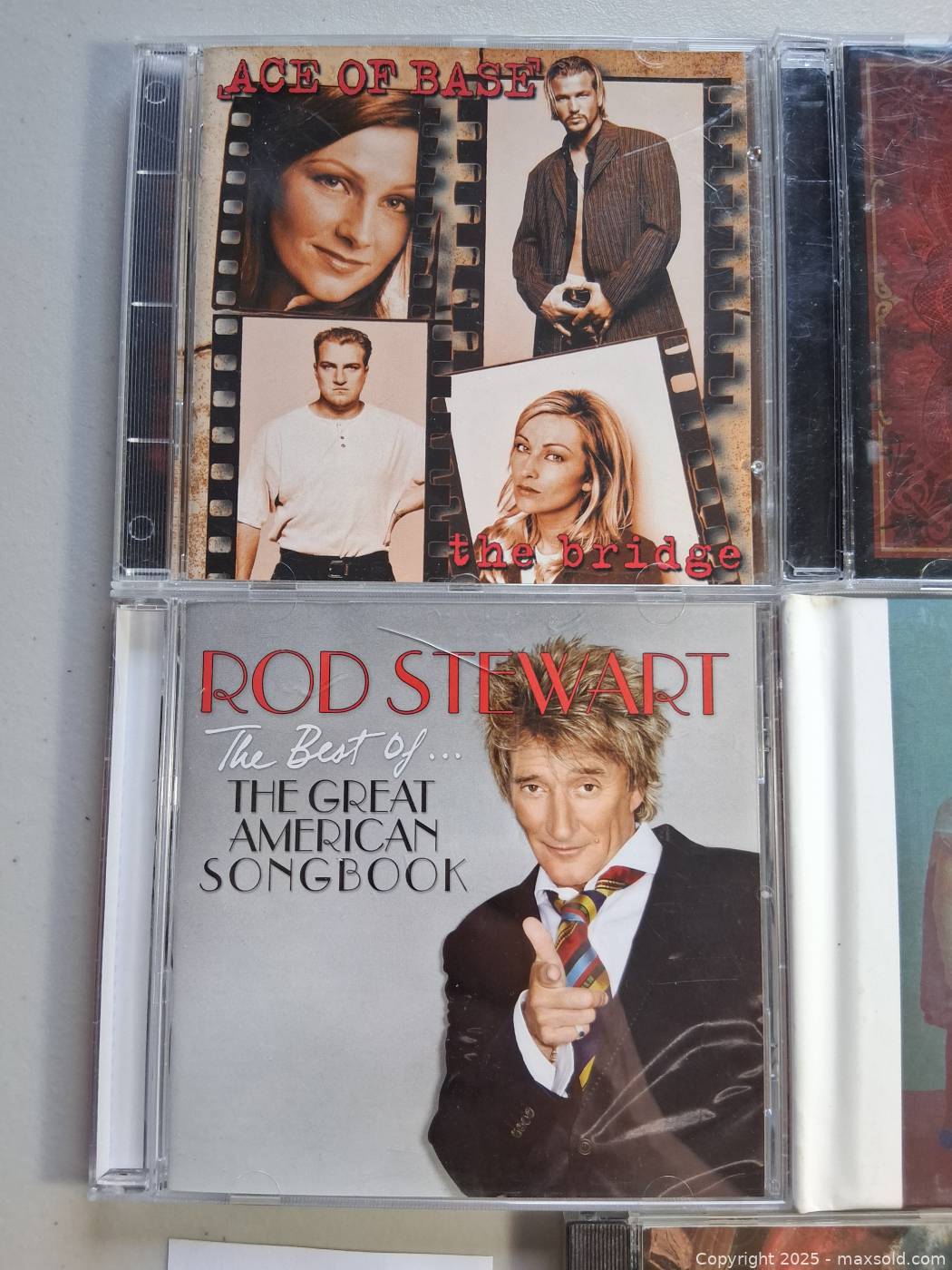 Five rock music CDs | Maxsold