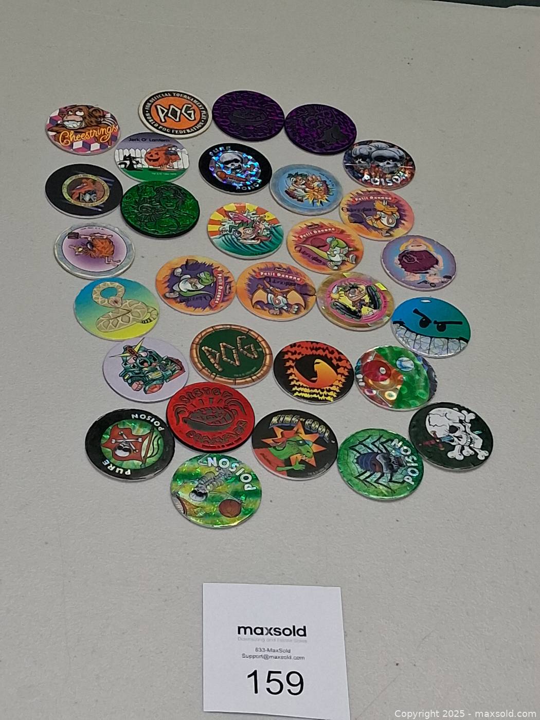 29 assorted POG milk caps and plastic slammers | Maxsold