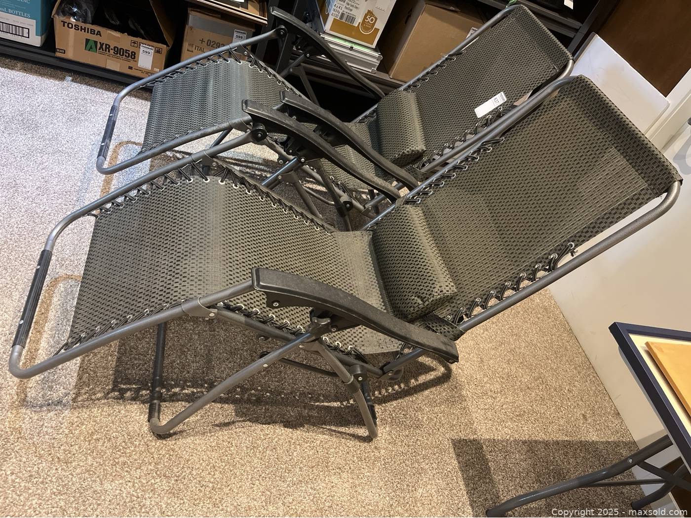 Pair of folding zero gravity outdoor chairs | Maxsold